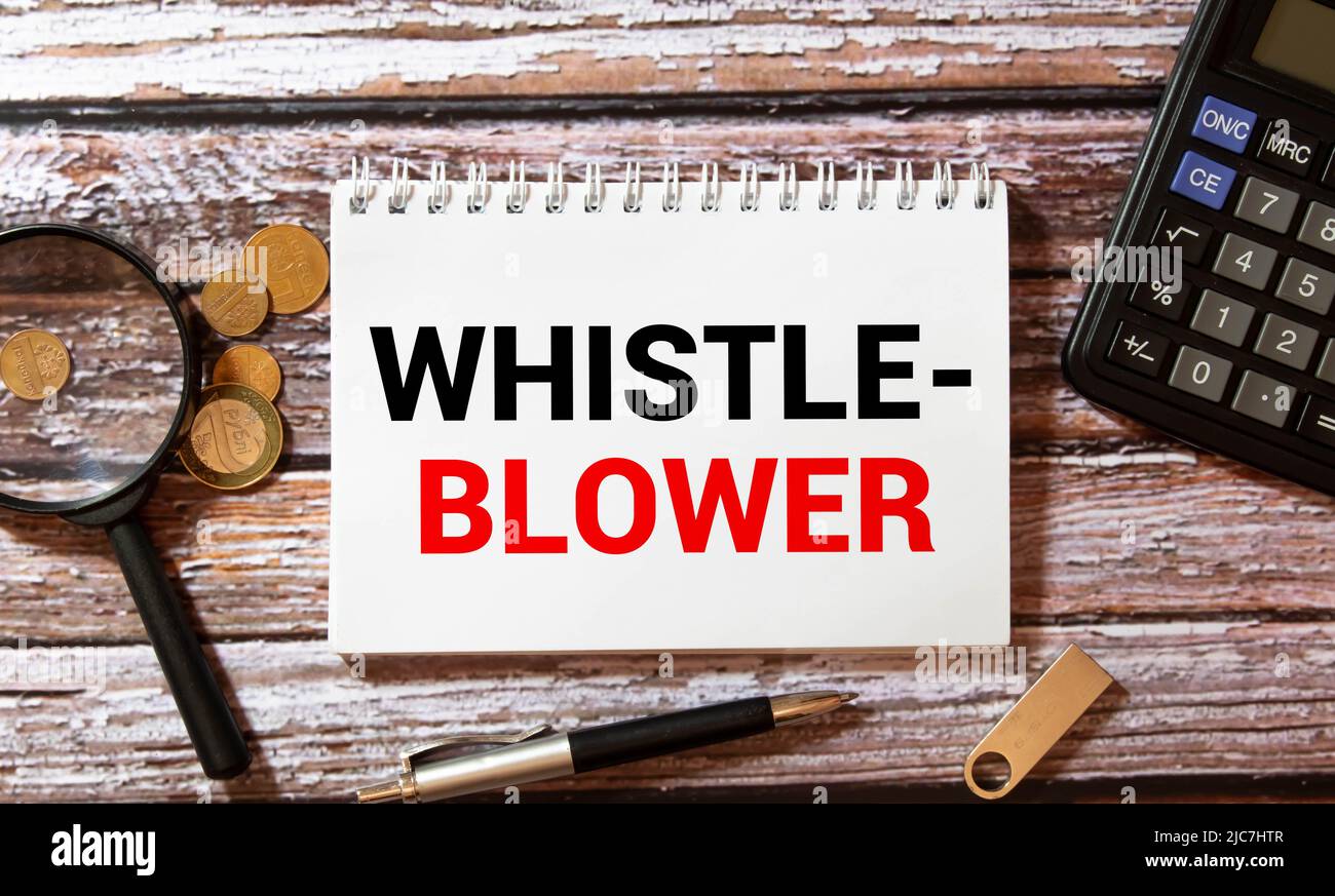 Whistle Blower - Woman holding chalkboard with text Stock Photo - Alamy