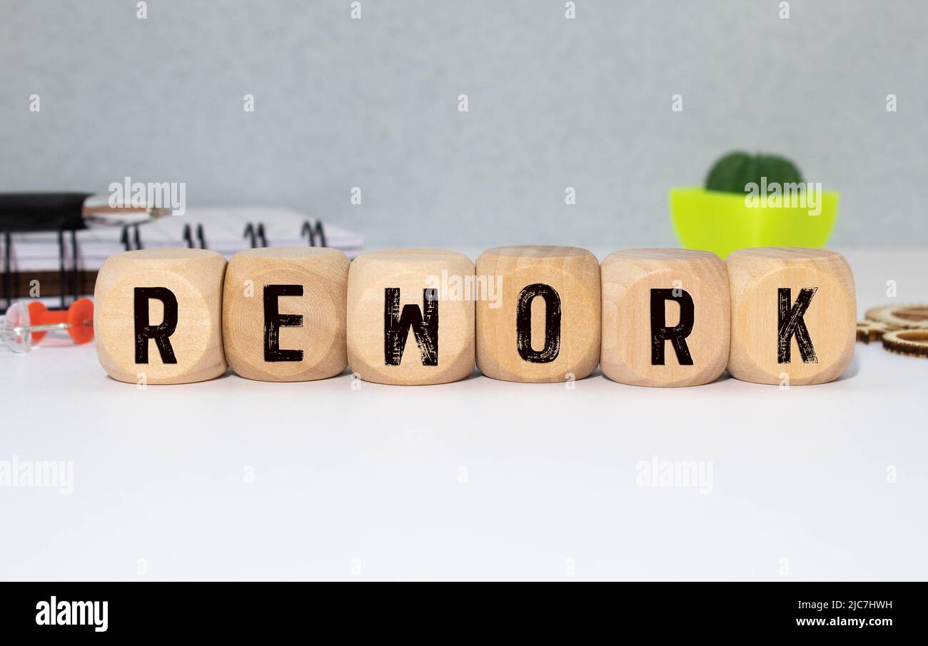 Alphabet letter block in word rework on wood background Stock Photo - Alamy