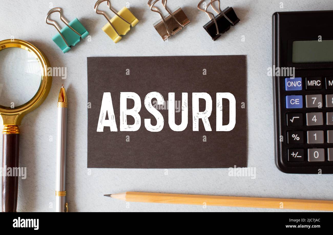absurdism word write on paper Stock Photo - Alamy