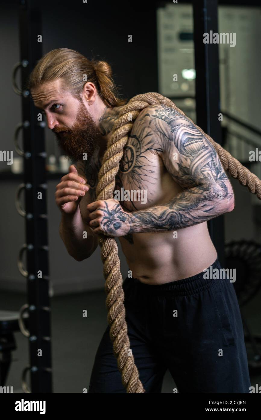 Rope invisible man tug pull was casual force person competition ...