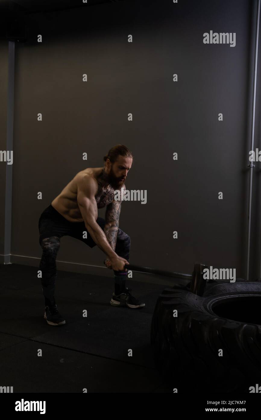 Sledgehammer tire active huge athlete wheel athletic body bodybuilding ...