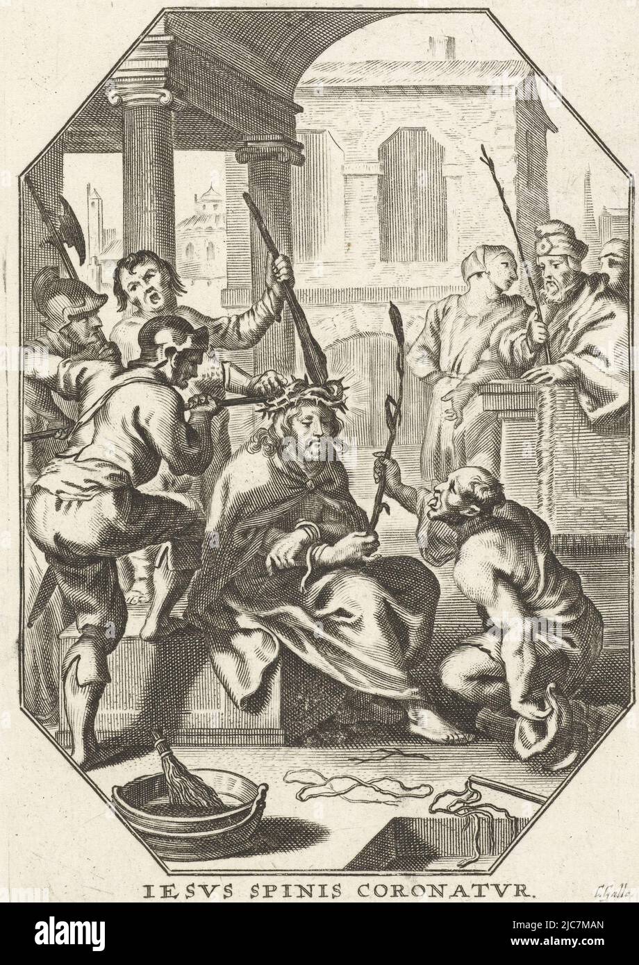 A group of soldiers crown Christ with the crown of thorns. One of the ...