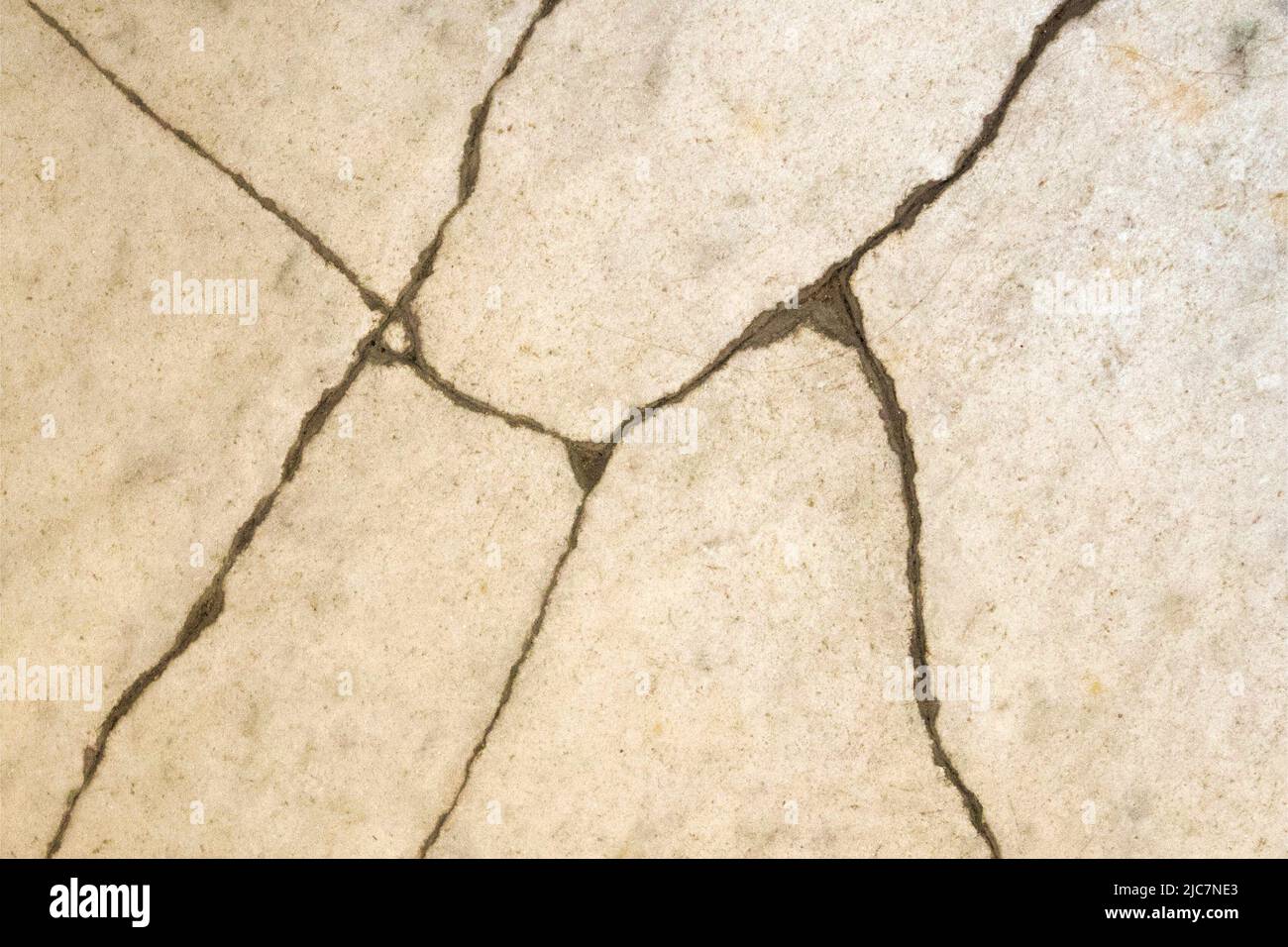 cracks in the concrete floor Stock Photo - Alamy