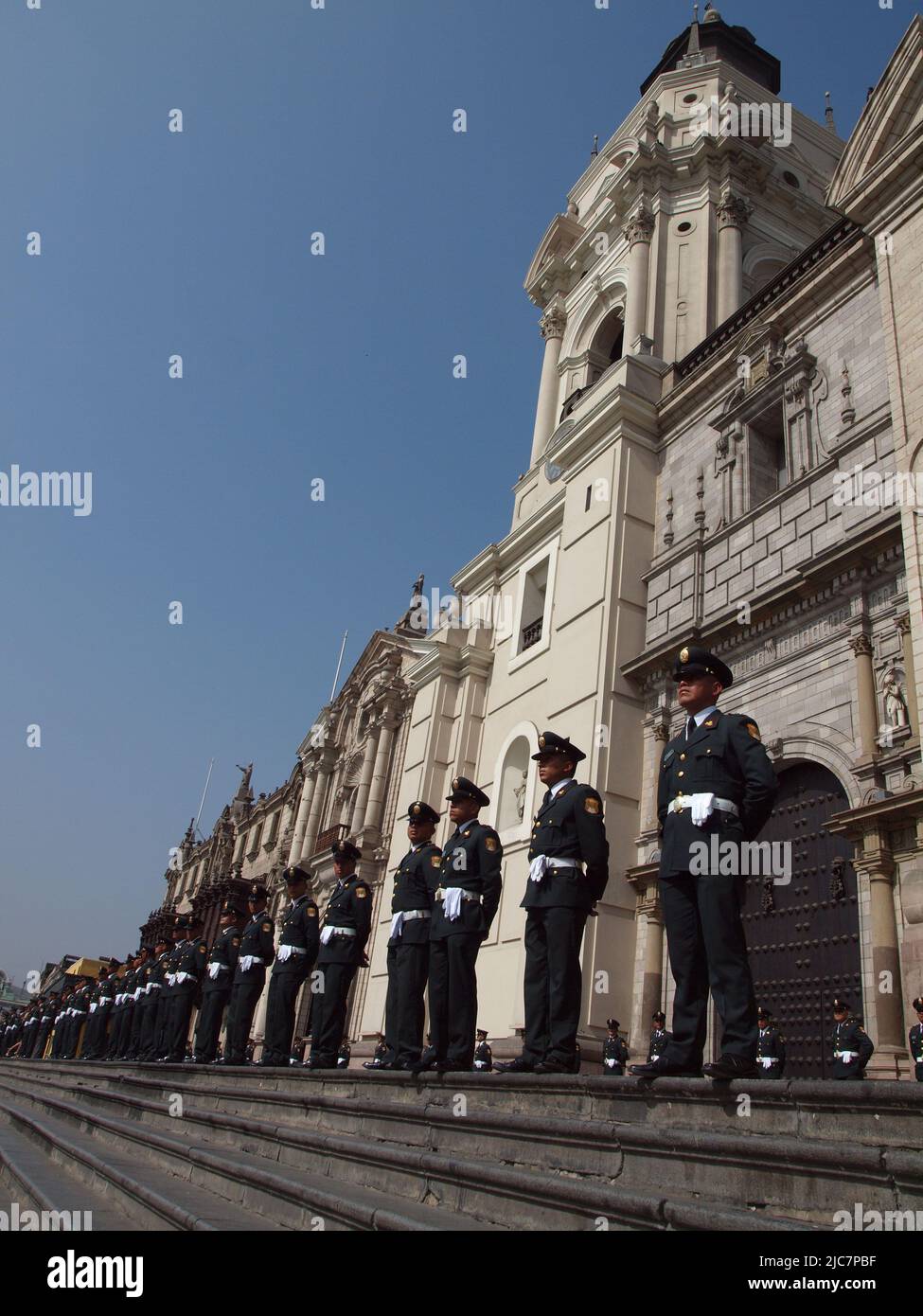 Police guard at the facade of the cathedral, guarding the procession of ...