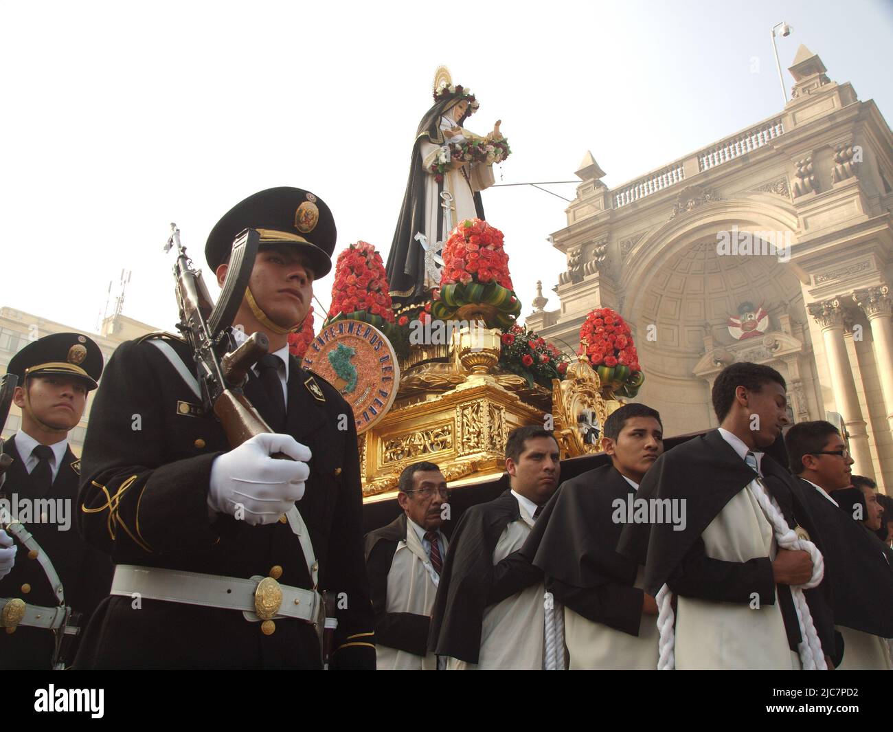 Police guard at the street, guarding the procession of Saint Rose of ...