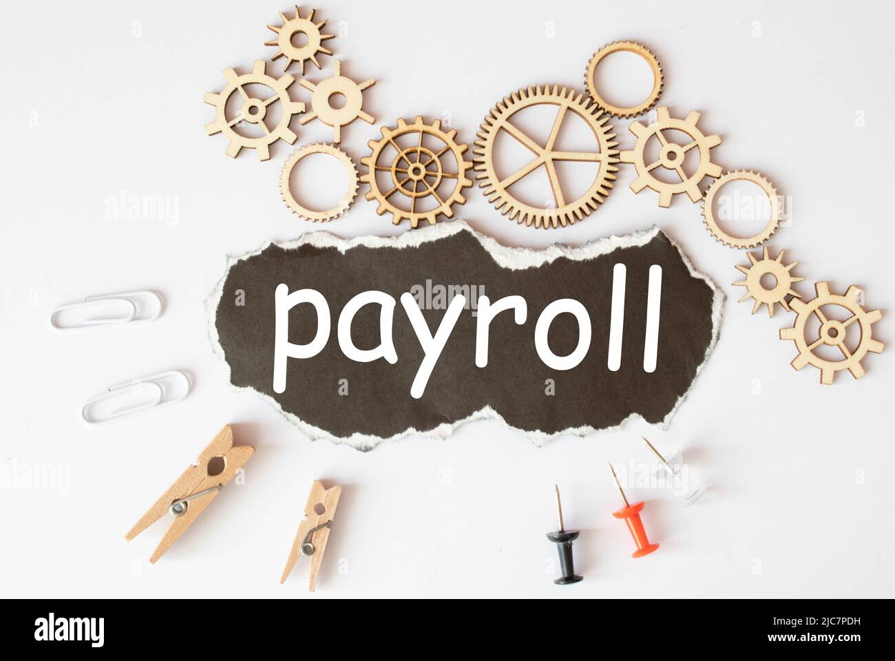 White paper with text PAYROLL isolated on blue background Stock Photo ...