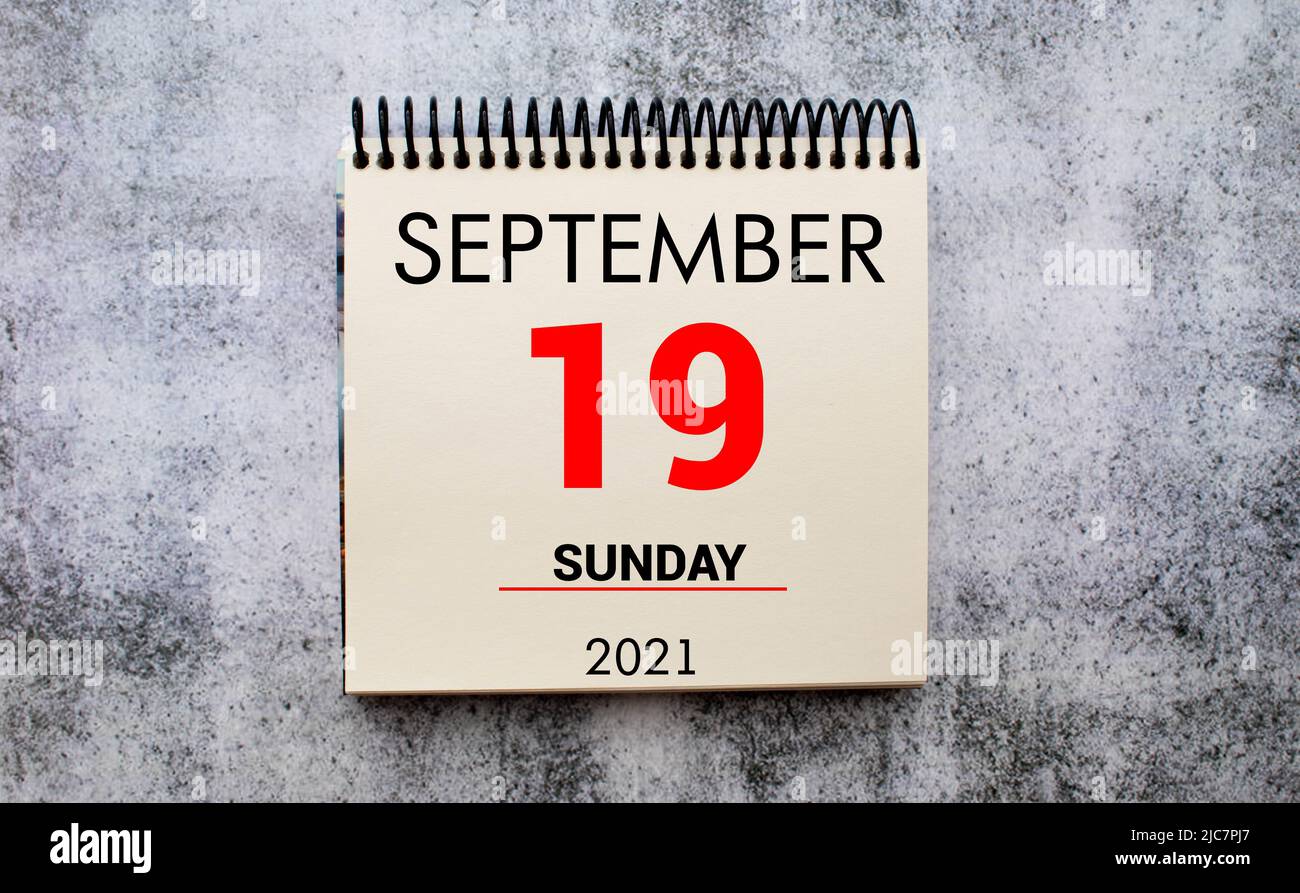 Save the Date written on a calendar - September 19 Stock Photo - Alamy