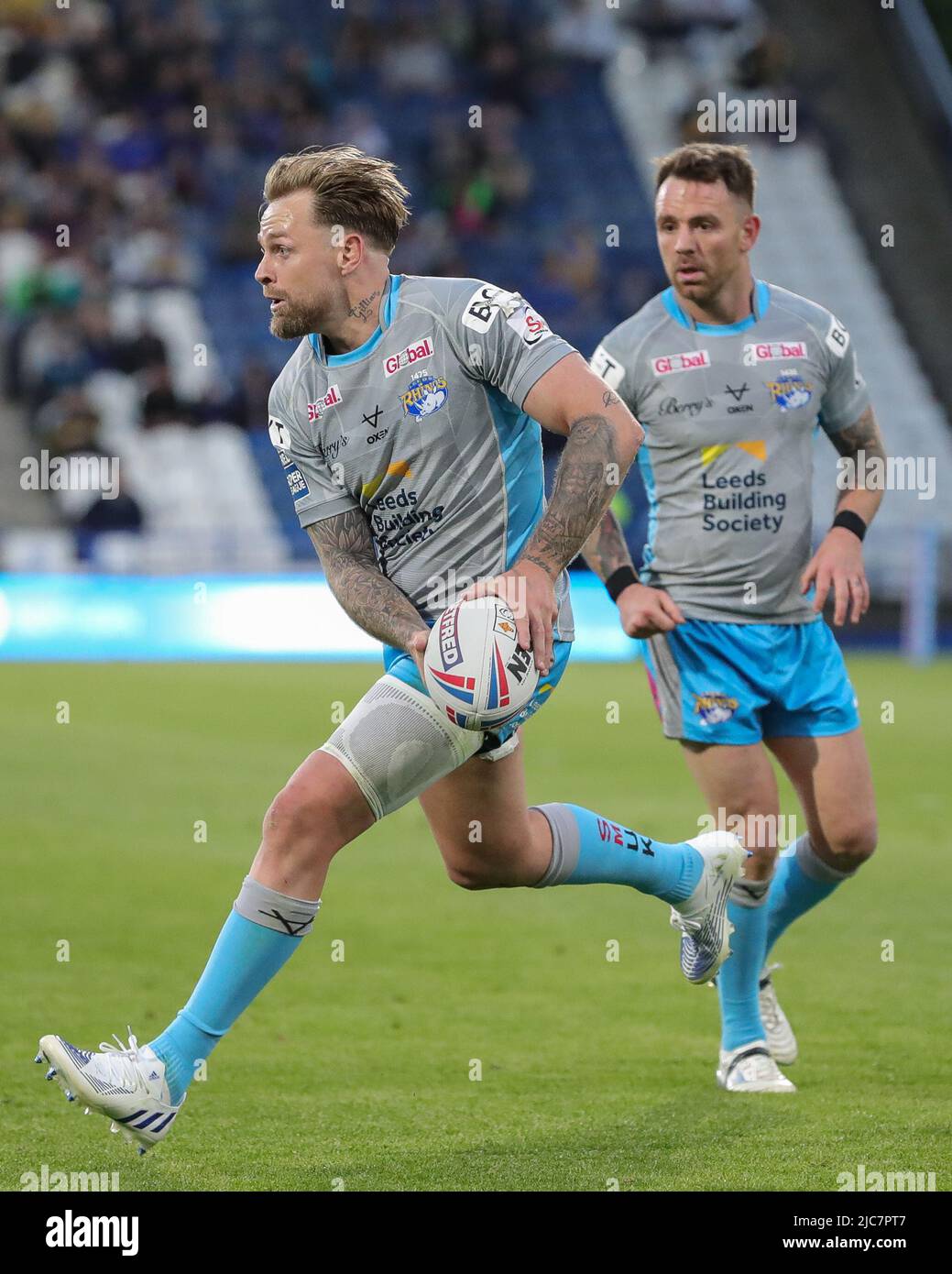 Huddersfield, UK. 10th June, 2022. Blake Austin #6 of Leeds Rhinos runs ...