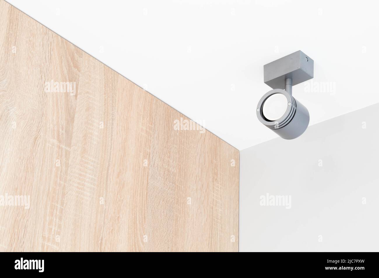 Spotlight, light bulb on white ceiling, interior concept Stock Photo ...