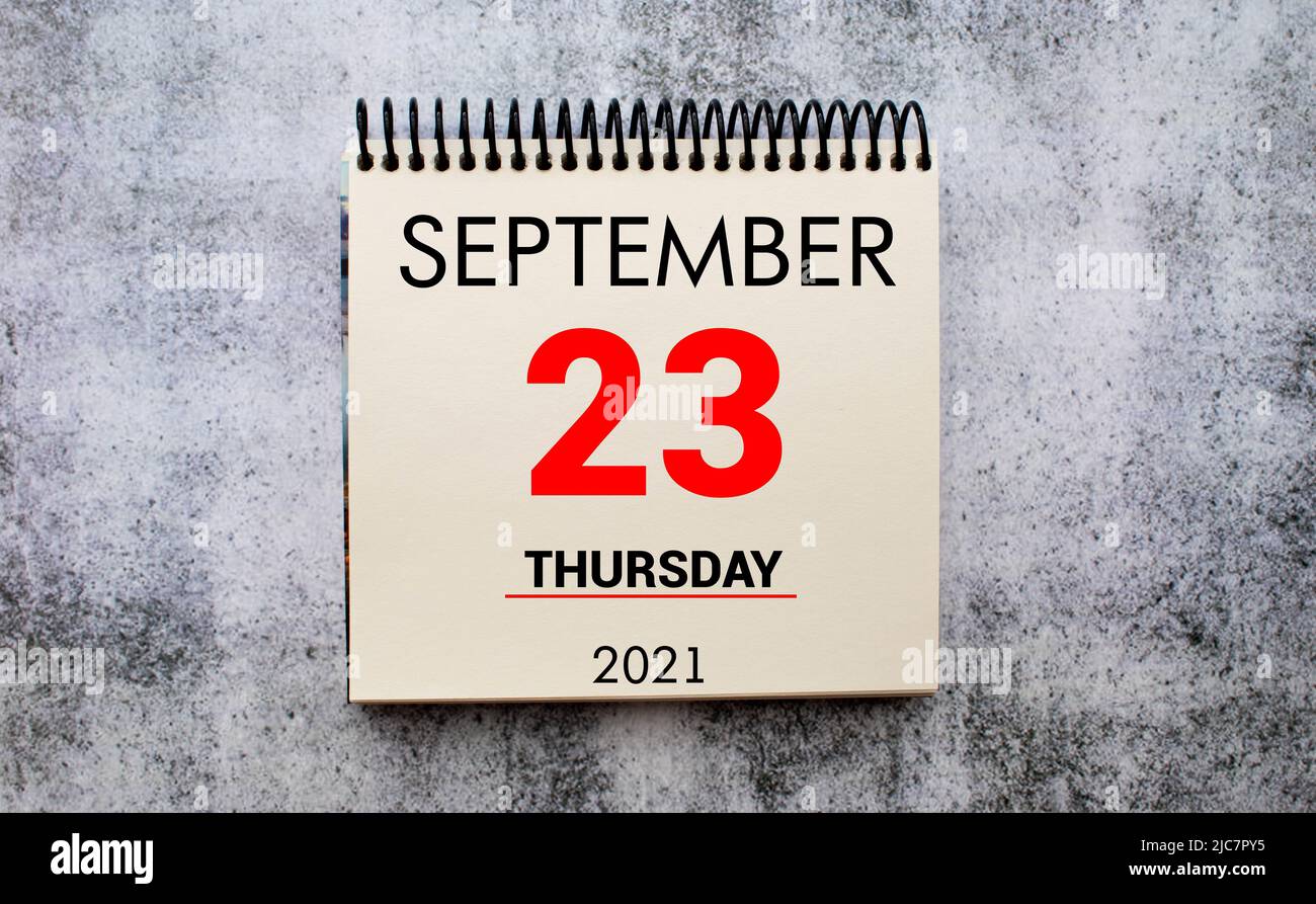 Save the Date written on a calendar - September 23 Stock Photo - Alamy