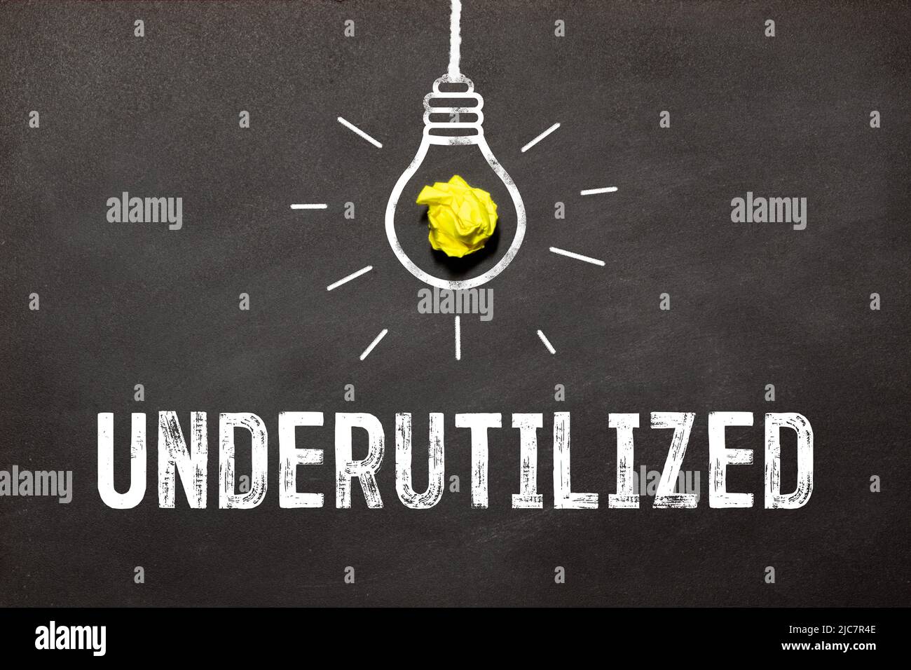 word Underutilized on black background Stock Photo - Alamy