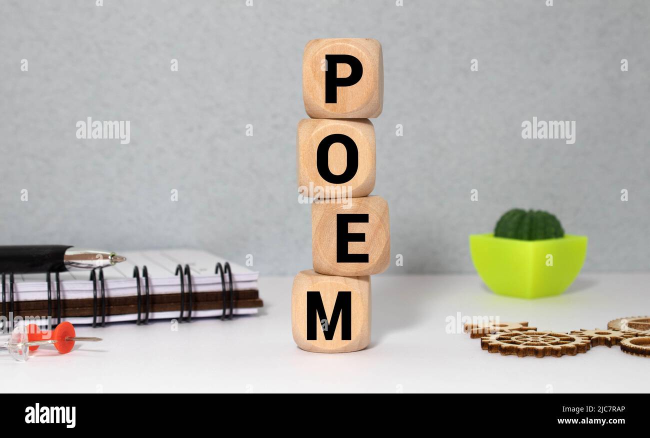 Word poem made with block wooden letters next to a pile of other ...