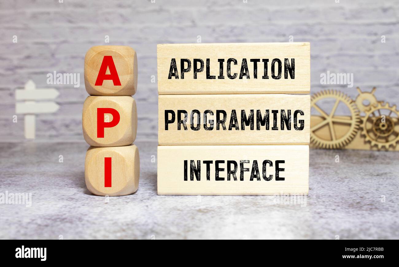 API word written on wood block. application program interface text on ... API word written on wood block. application program interface text on ...