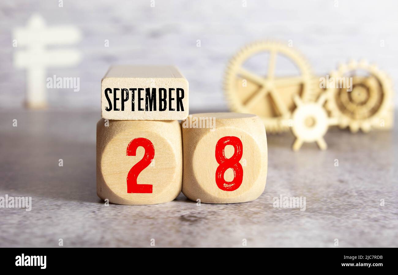September 28st. Day 28 of month, daily calendar on white table with ...