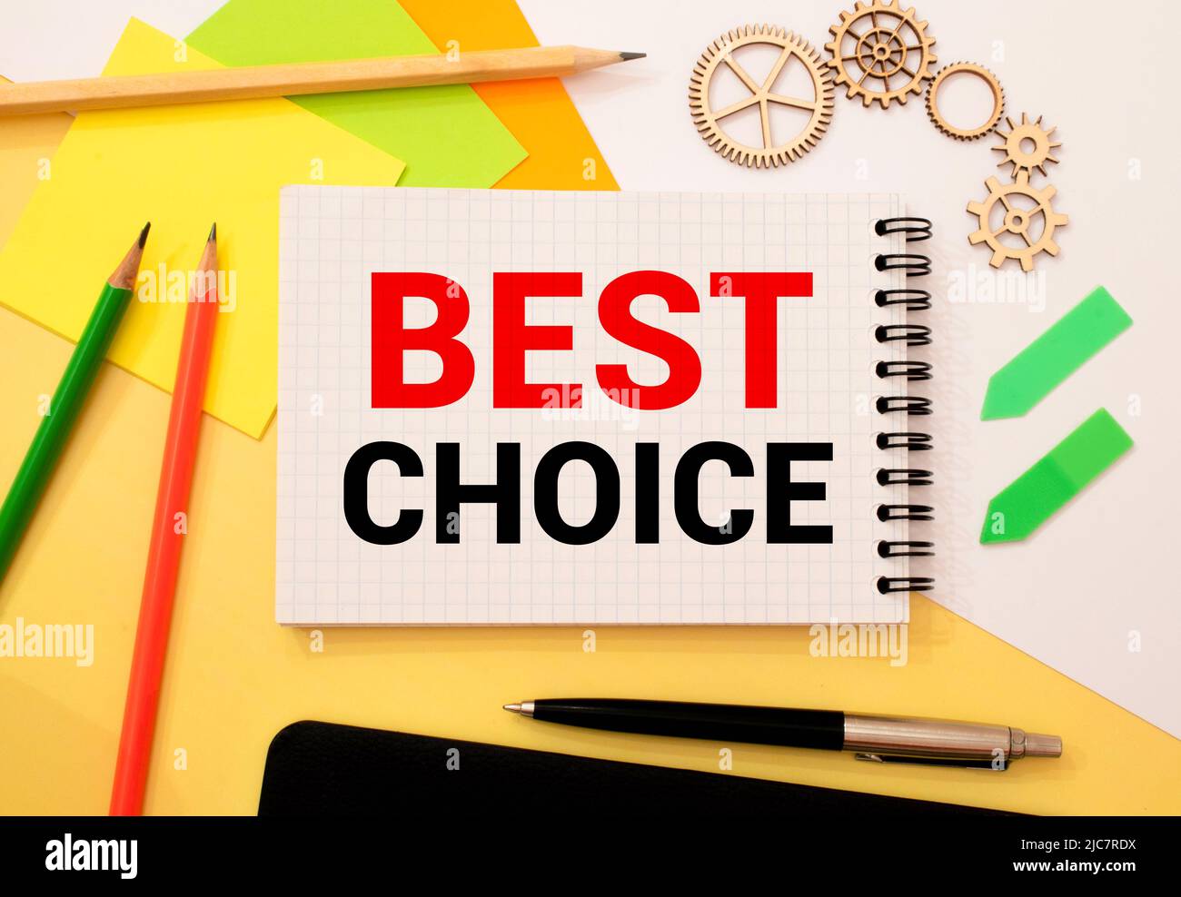 A hand with a marker writing 'Best Choice' Stock Photo - Alamy
