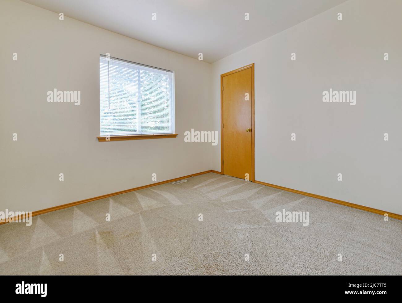 Modern residential empty bedroom interior Stock Photo - Alamy