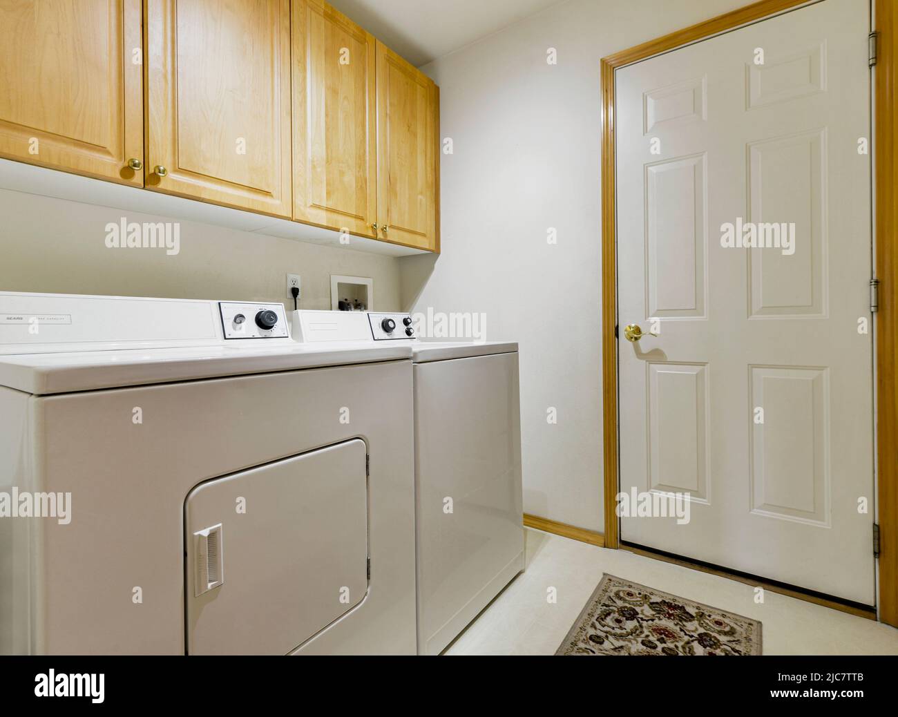 Modern residential laundry room interior Stock Photo - Alamy