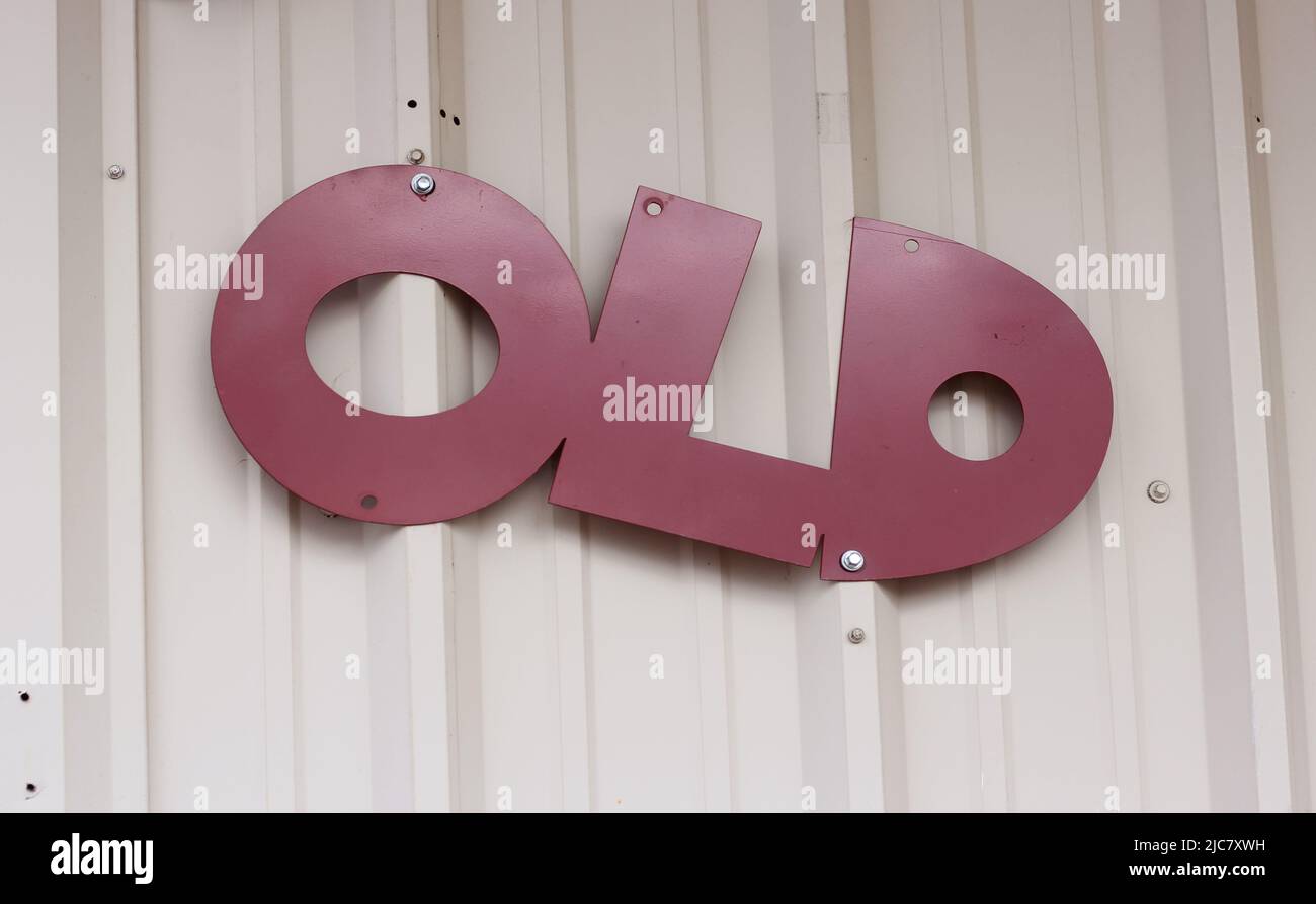 Vintage Metal Sign on Exterior of Small Local Business - Old Stock ...