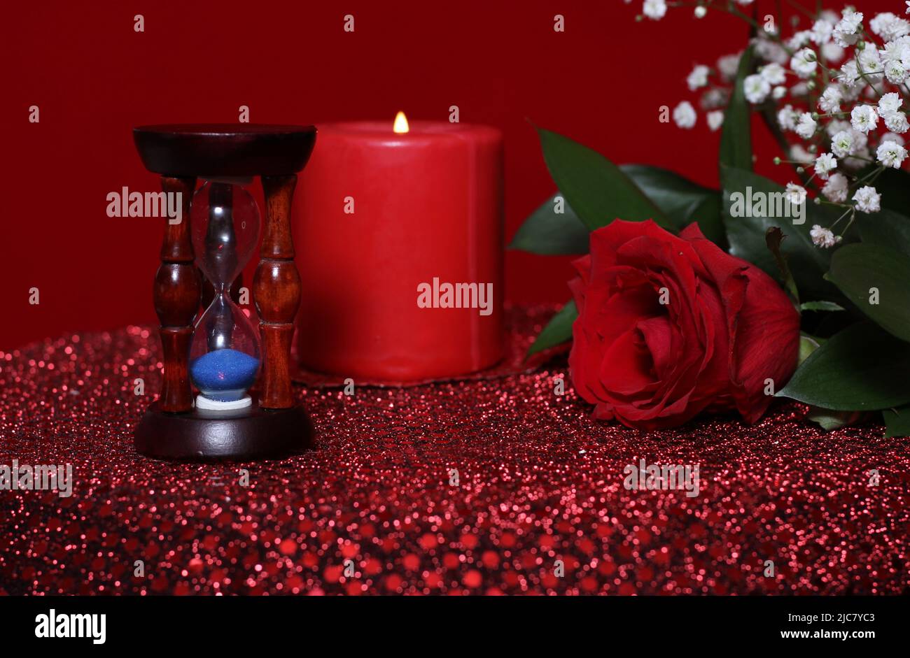 Red Candle and Rose on Red Velvet Background Stock Photo - Alamy