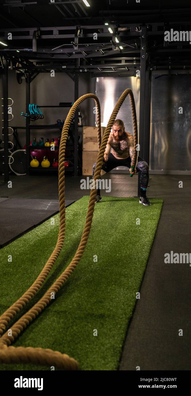 Rope warehouse fitness green man grass training gym muscular young, for ...