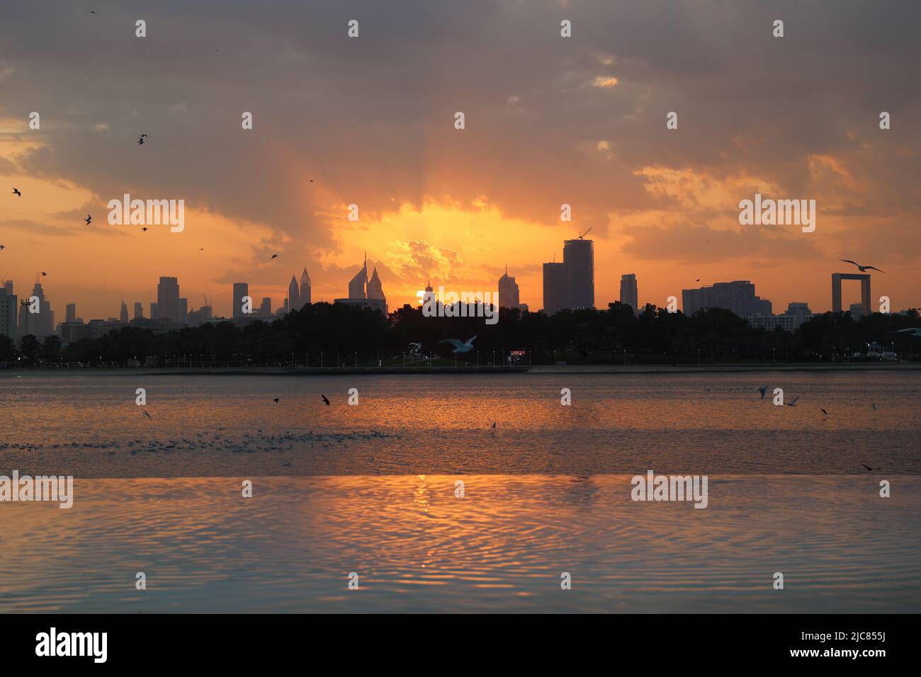Dubai sunset skyline cityscape view, skyscrapers in UAE, Middle East ...