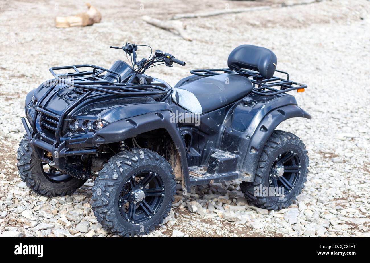 ATV Quad Bike in front of mountains landscape. Skiing and outdoor ...