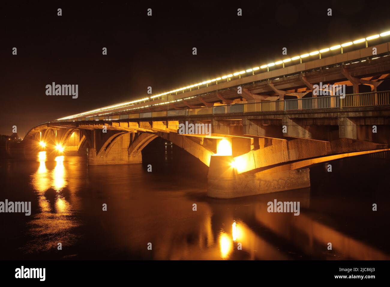 Lights bridge reflected in hi-res stock photography and images - Alamy