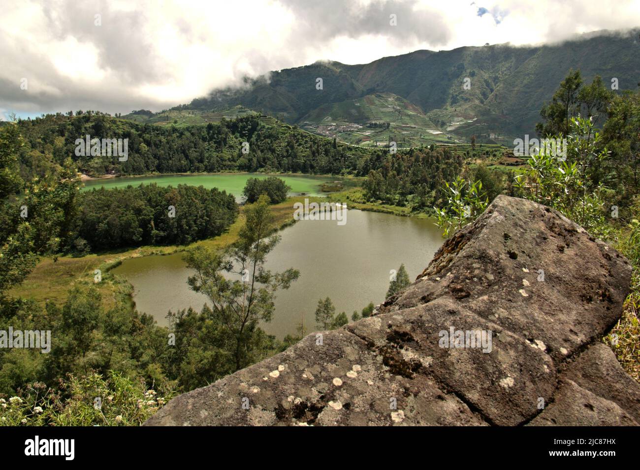 Aerial landscape of Dieng plateau with Telaga Warna lake and Pengilon ...