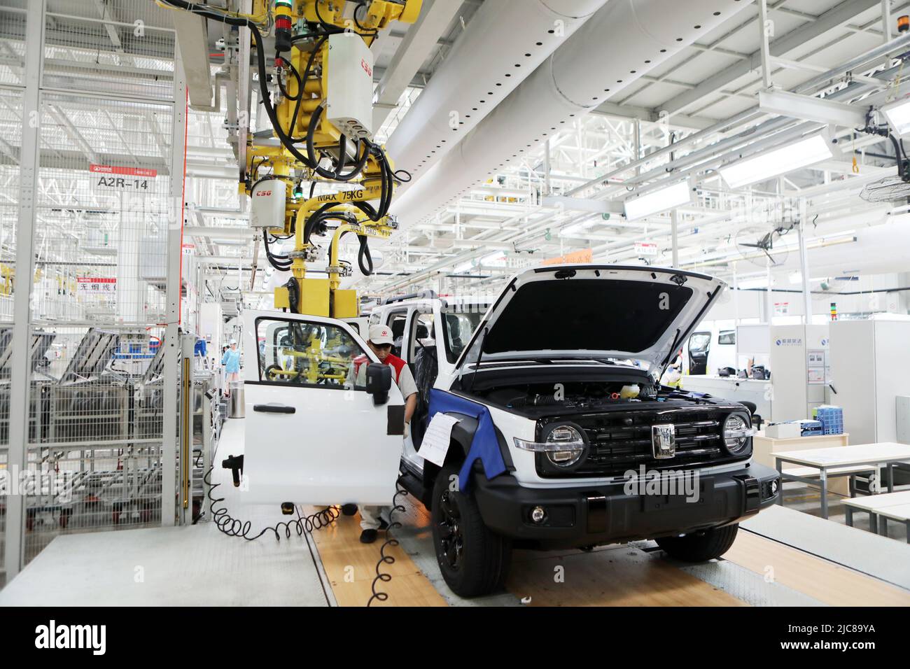 CHONGQING, CHINA - JUNE 11, 2022 - Employees install a tank 300 body at ...