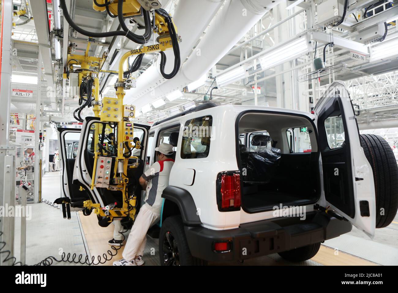 CHONGQING, CHINA - JUNE 11, 2022 - Employees install a tank 300 body at ...