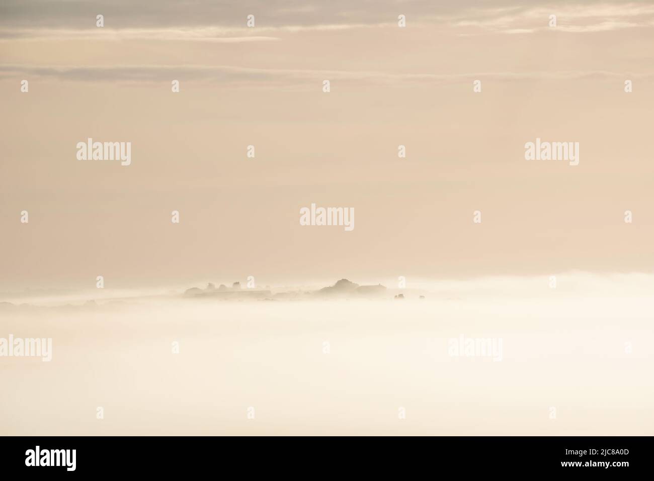 Beautiful landscape image of sea of fog rolling across South Downs ...
