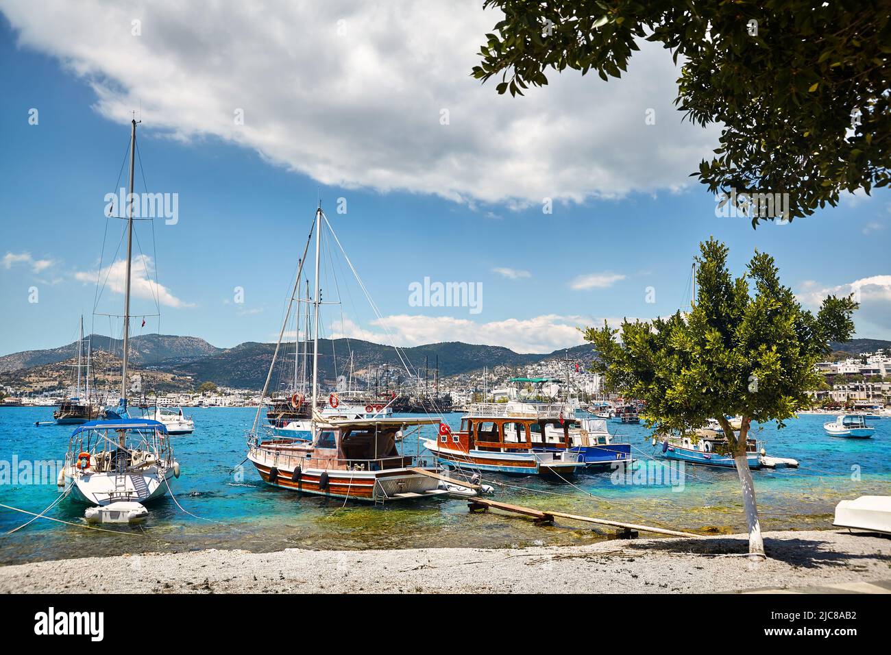 View of Bodrum Beach from Promenade. Sailing boats, yachts at Aegean ...