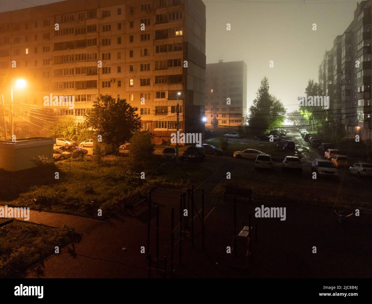 foggy summer night in russian suburban condo street Stock Photo - Alamy