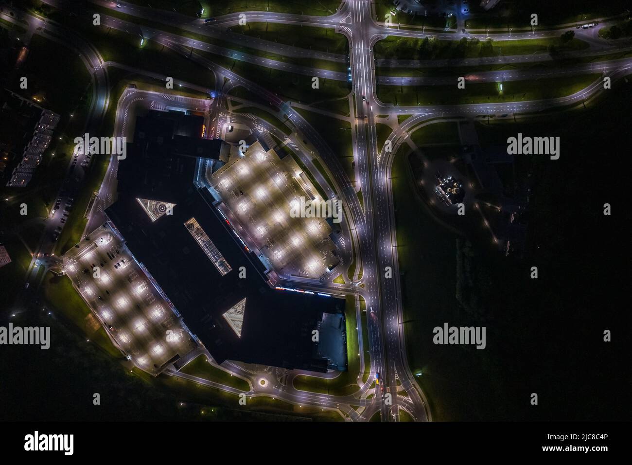 night over road junction, intersection road with cars with headlights ...