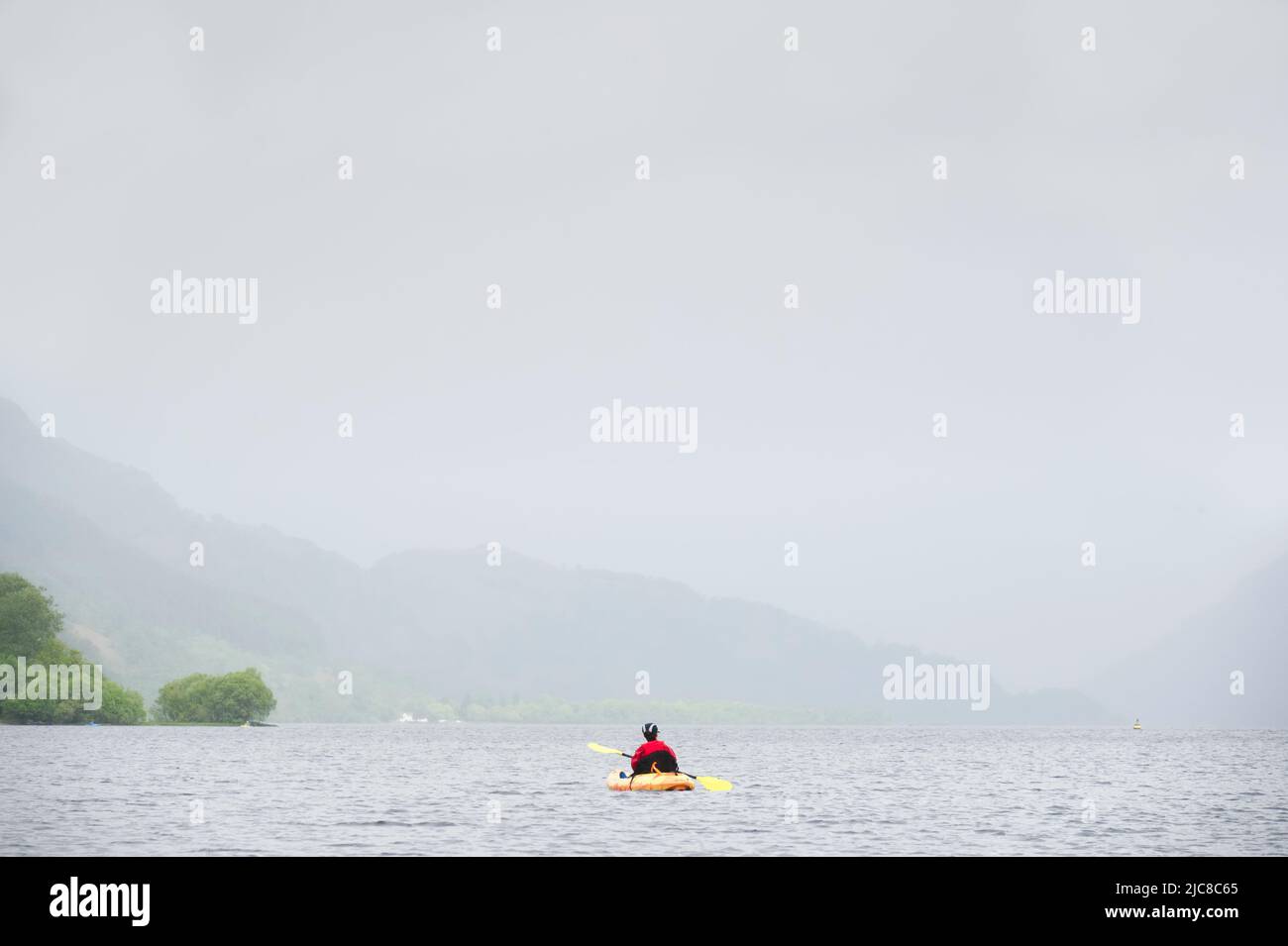 Yellow sports kayak on water hi-res stock photography and images - Alamy