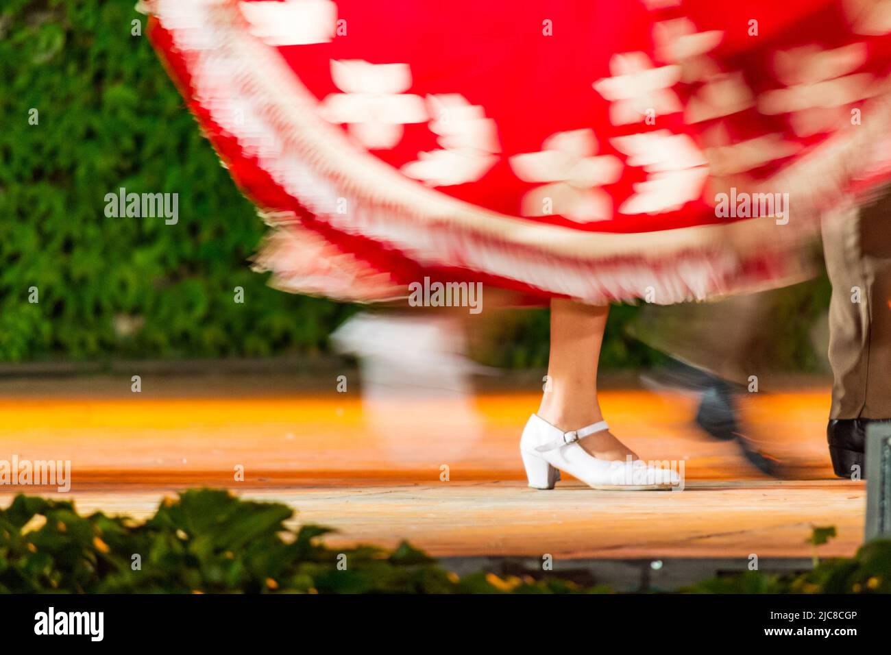 Latin American women dancers twirling amazing bright blurring motion ...