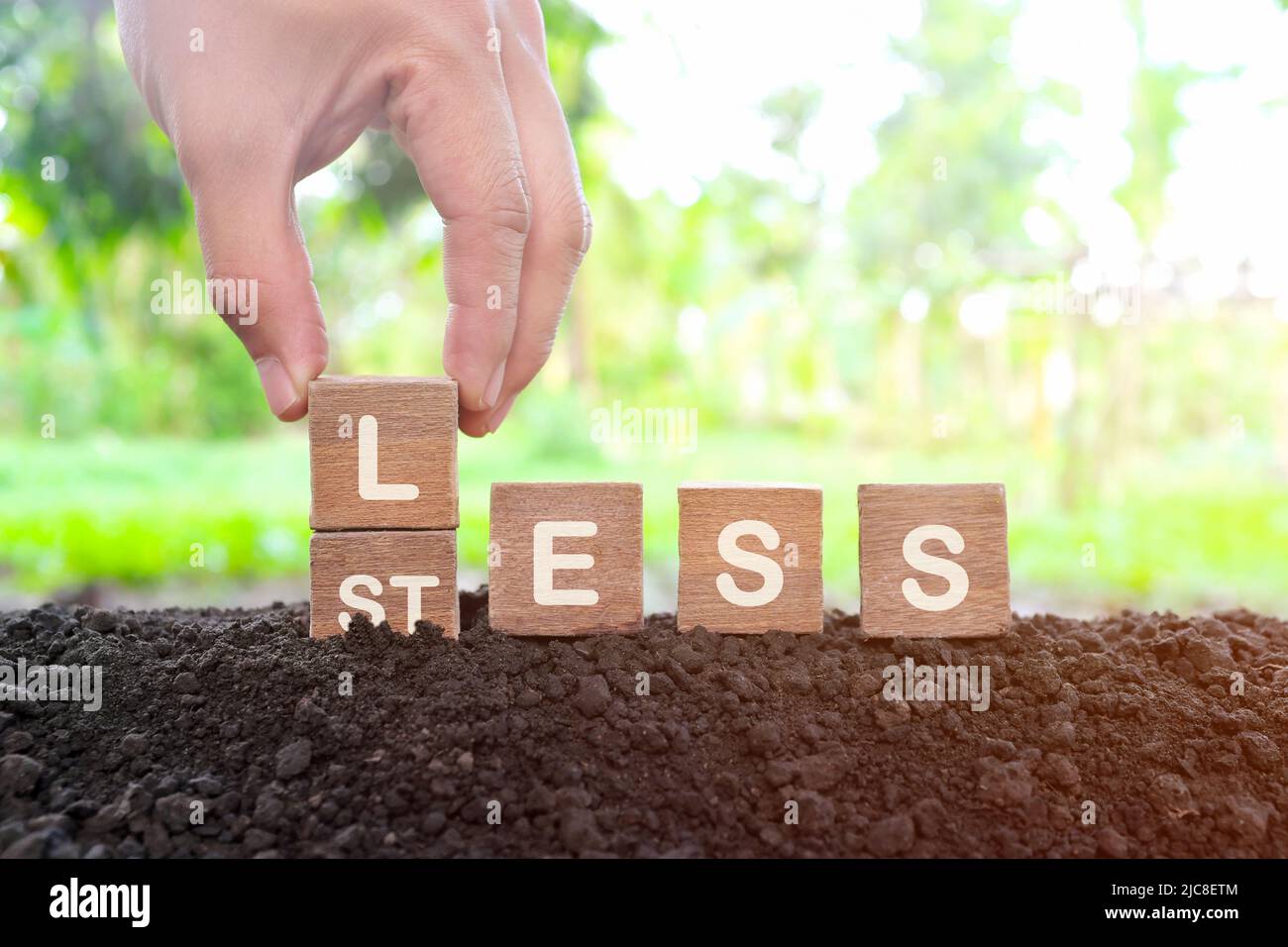 Less stress management concept. Hand changing stress to less word on ...