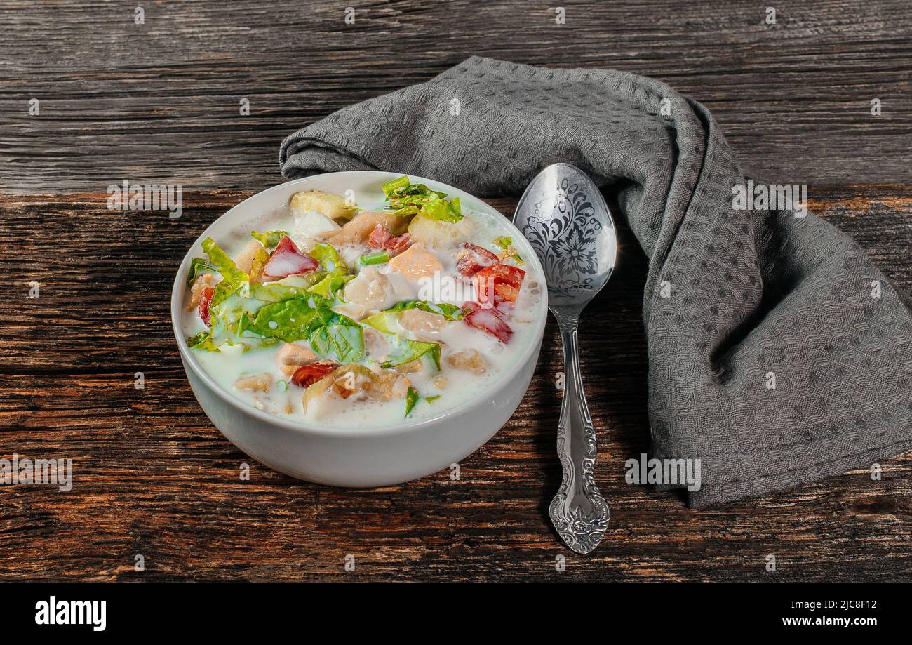 Traditional Russian cold soup okroshka with fresh potato, cucumber ...