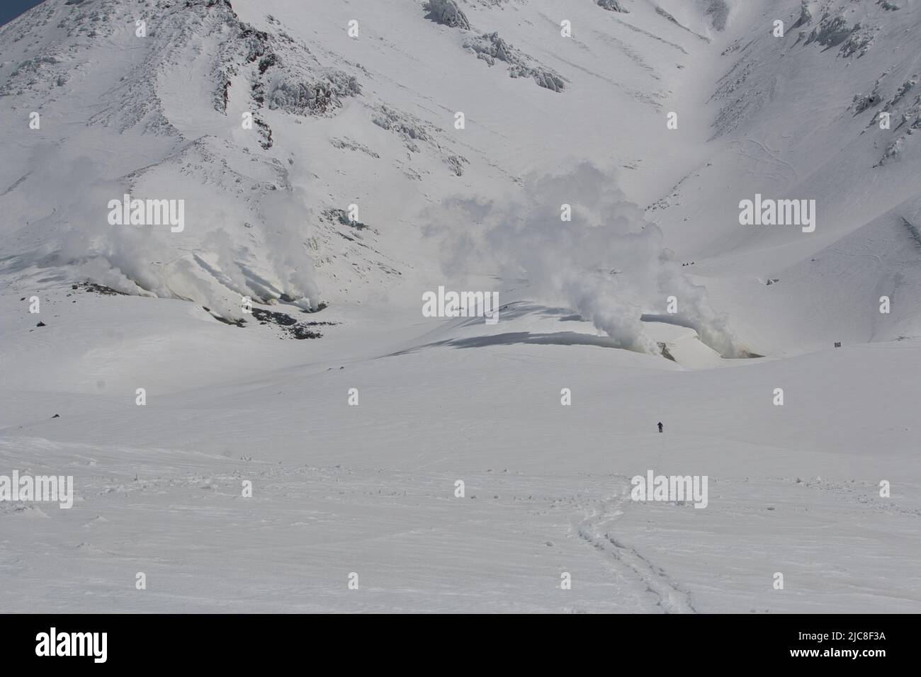 Steam rising from volcanic vents in a winter landscape Stock Photo - Alamy