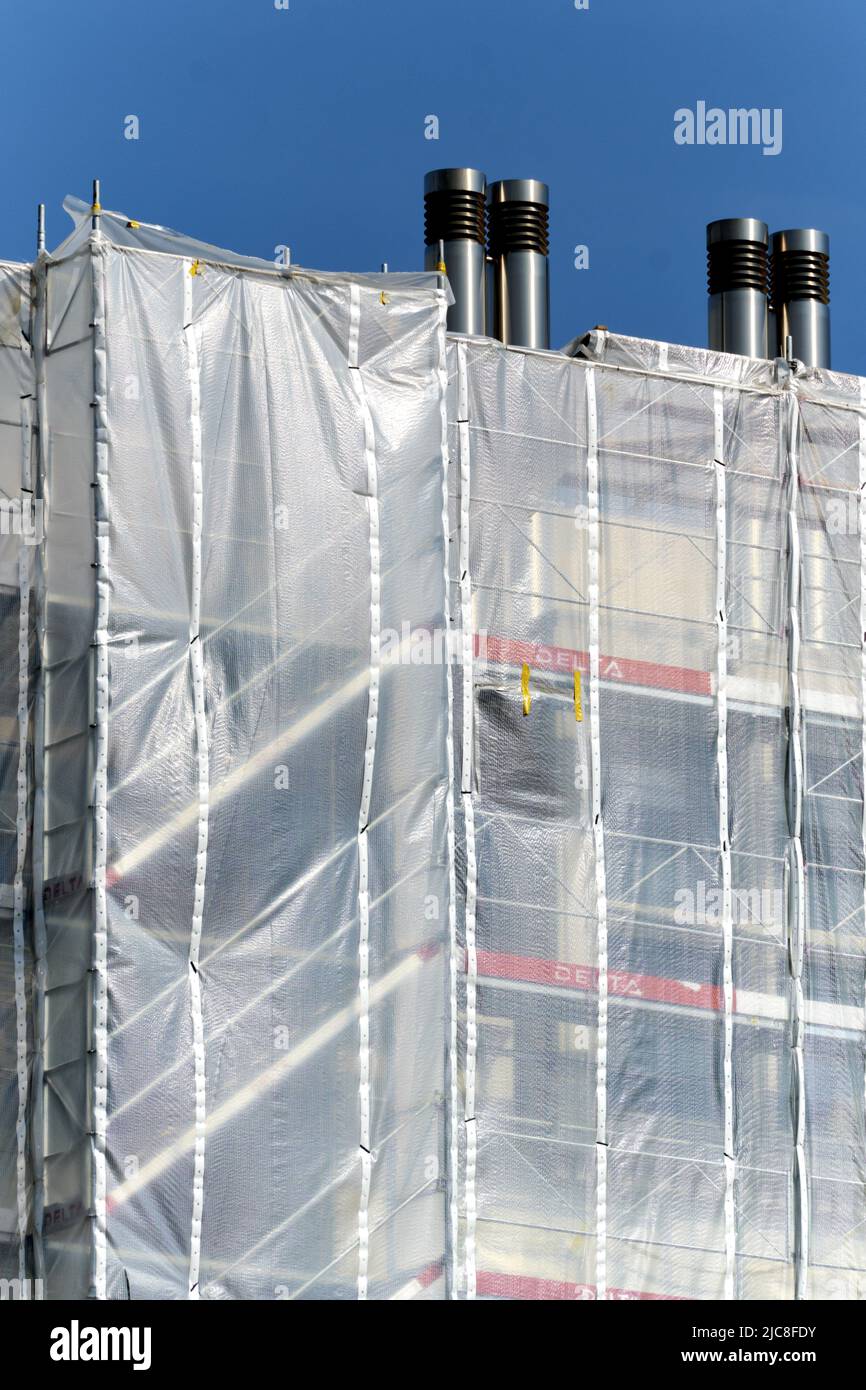 site with scaffolding and steel air vents Stock Photo - Alamy