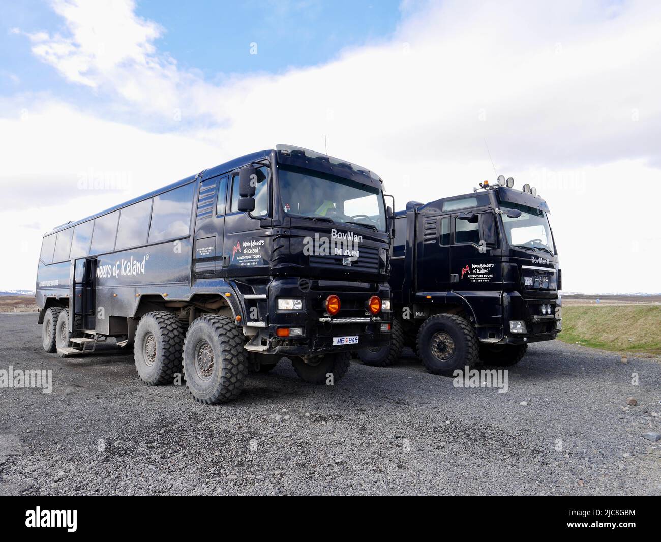Overland buses on gravel in Iceland, Gulfoss, 27.05.2022. High quality ...