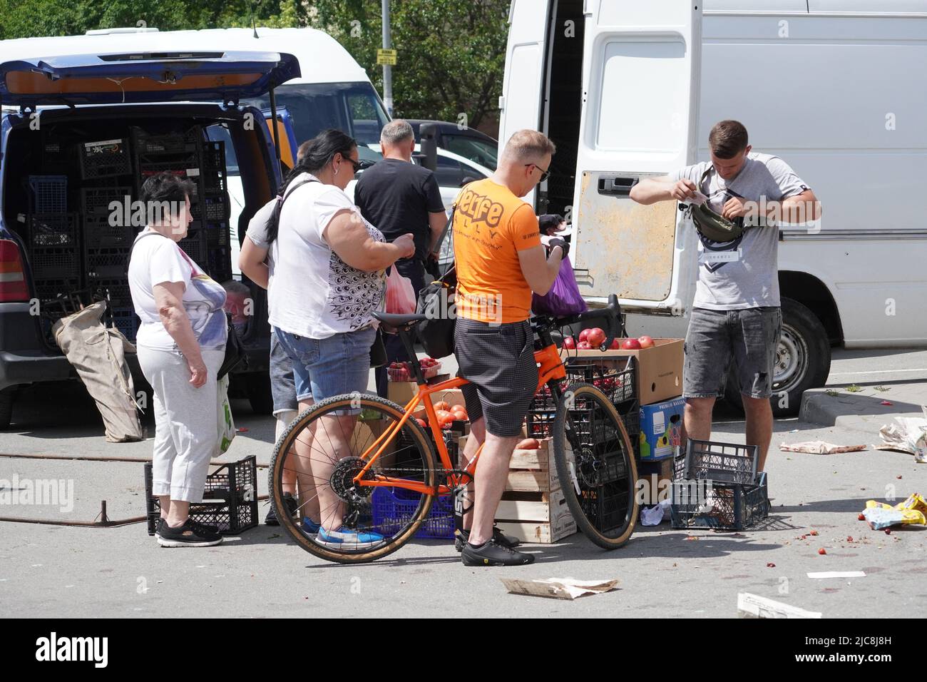 Bucha, Ukraine. 8th June, 2022. People buy vegetables and fruits in ...