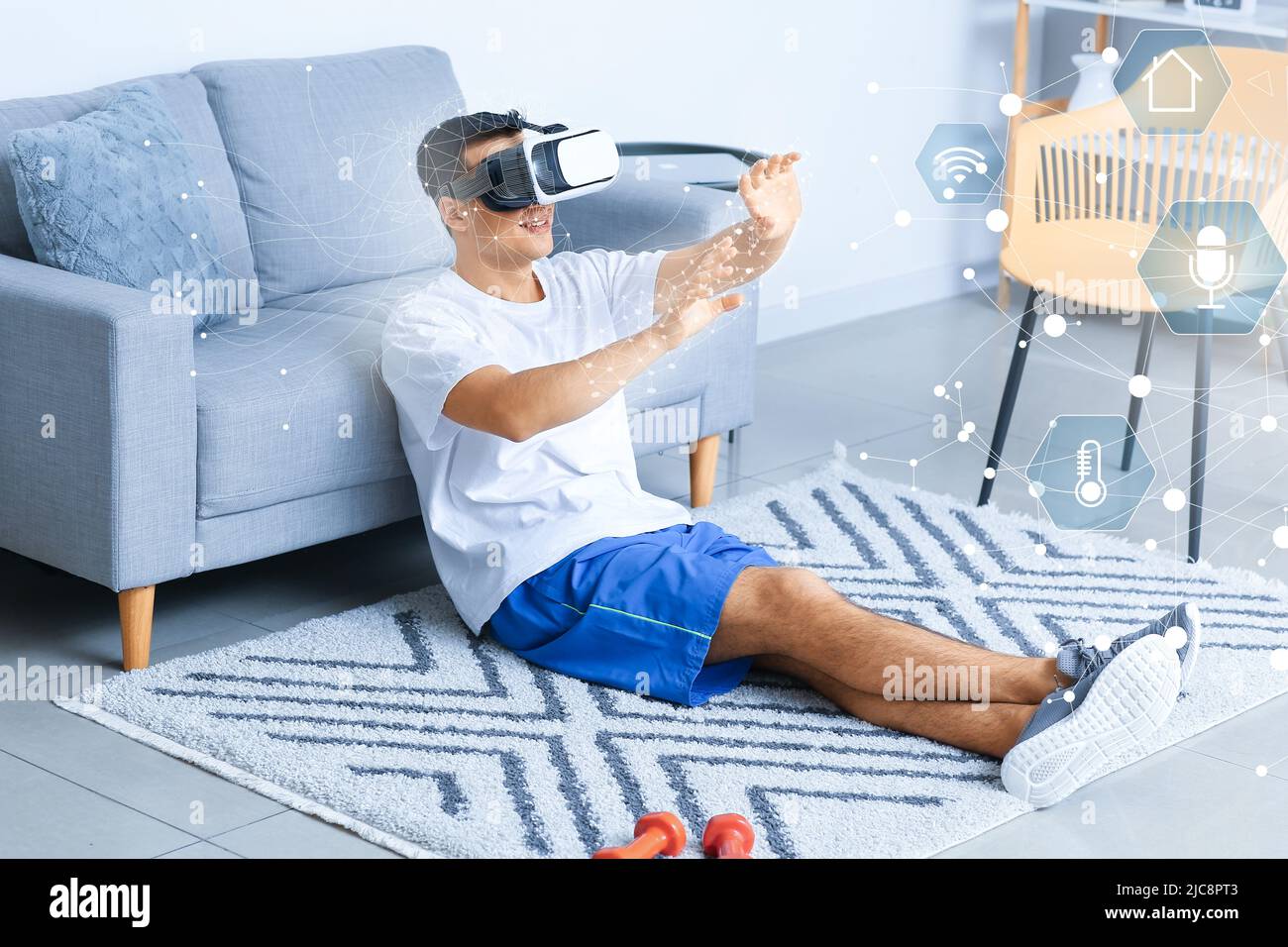 Man with VR glasses using application of smart home automation in room ...