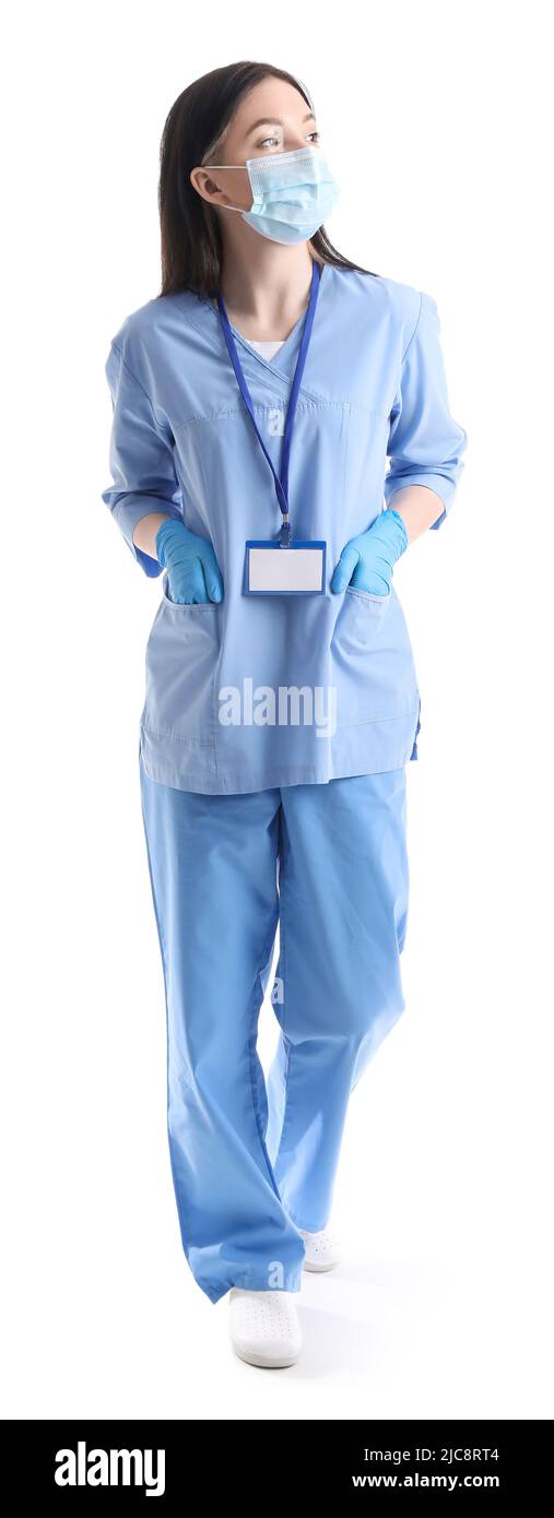 Female medical assistant in protective mask and gloves on white ...