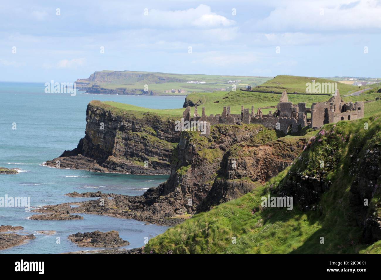 Dunluce Castle ruins of a medieval castle, Northern Ireland Stock Photo ...