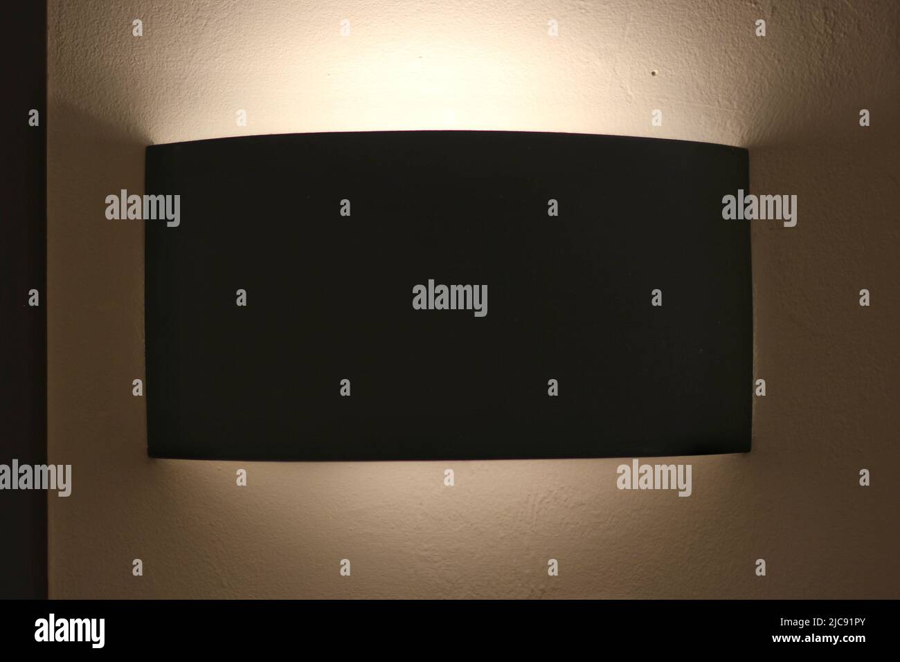 Simple plain lamp shade of a wall sconce Stock Photo - Alamy