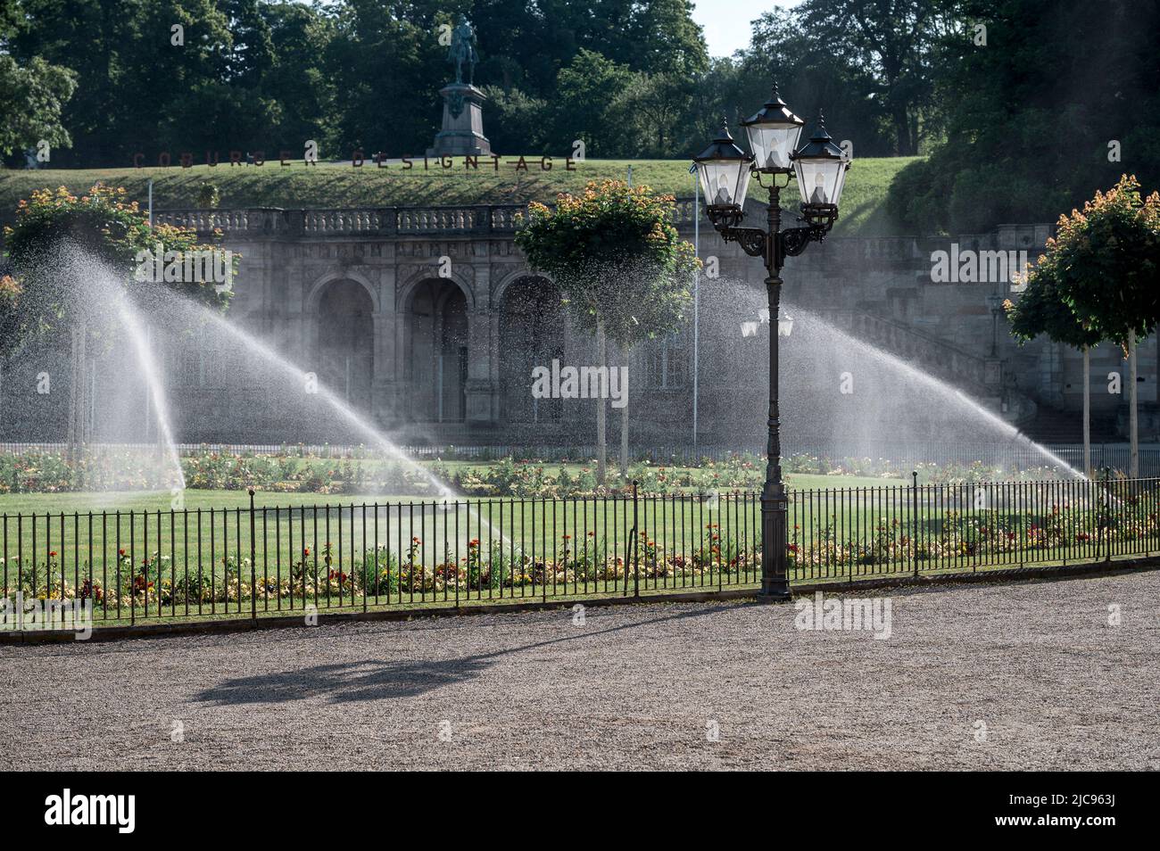 Coburg, Germany. 11th June, 2022. Flowers and lawns are watered with ...