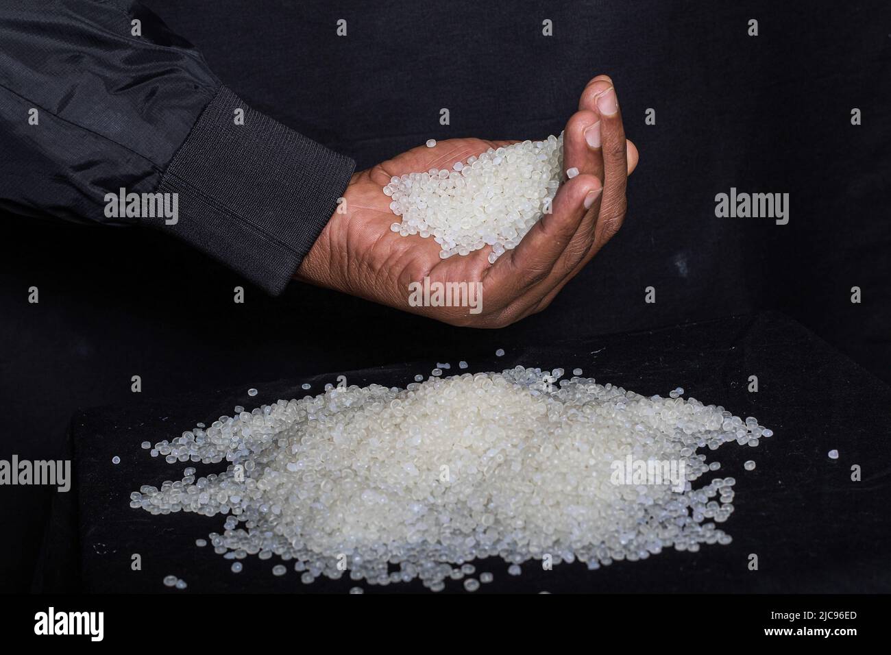 Tiny plastic pellets hi-res stock photography and images - Alamy