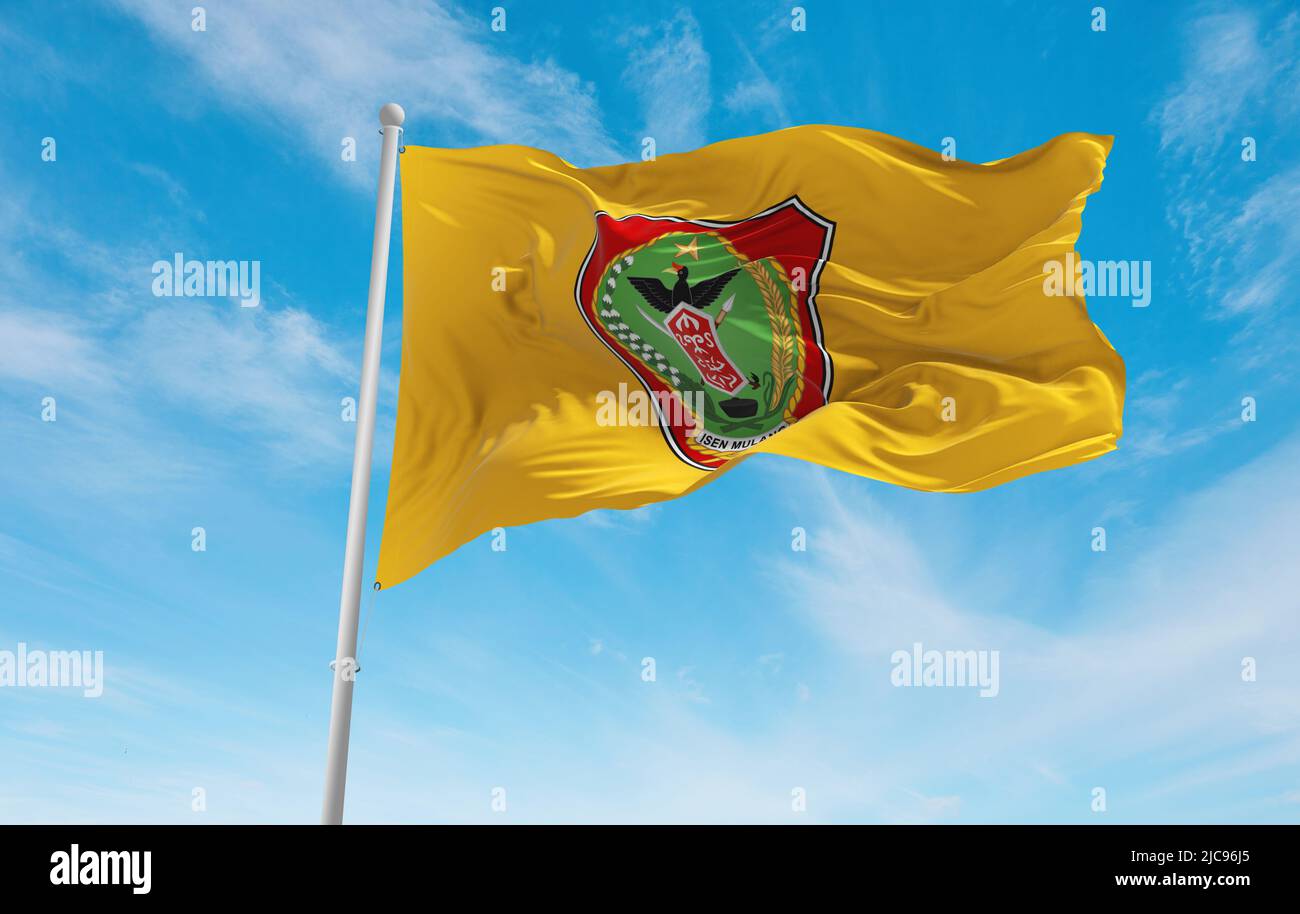 official flag of Central Kalimantan Indonesia at cloudy sky background ...