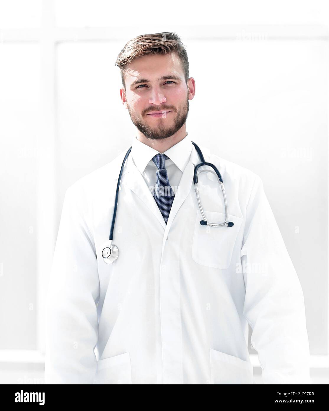 successful doctor the therapist, standing near the window Stock Photo ...